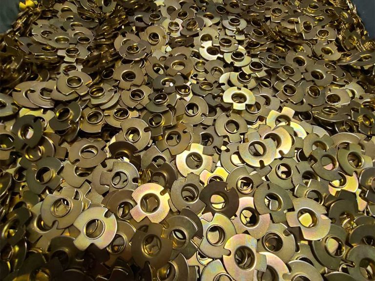 High Volume Metal Stamping | High Precision Stamping | QST