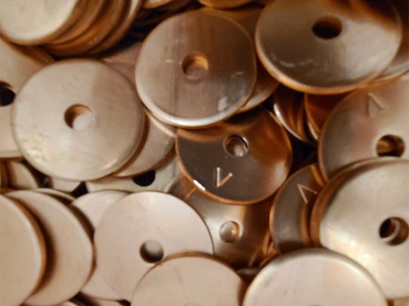 High Volume Metal Stamping | High Precision Stamping | QST